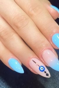 35 Enchanting Evil Eye Nails for a Mysterious and Trendy Manicure